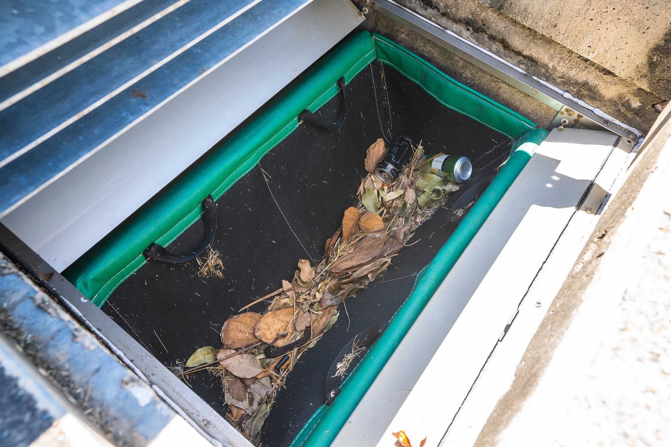 Council installs baskets to keep litter from Raby Bay canals - Redlands ...